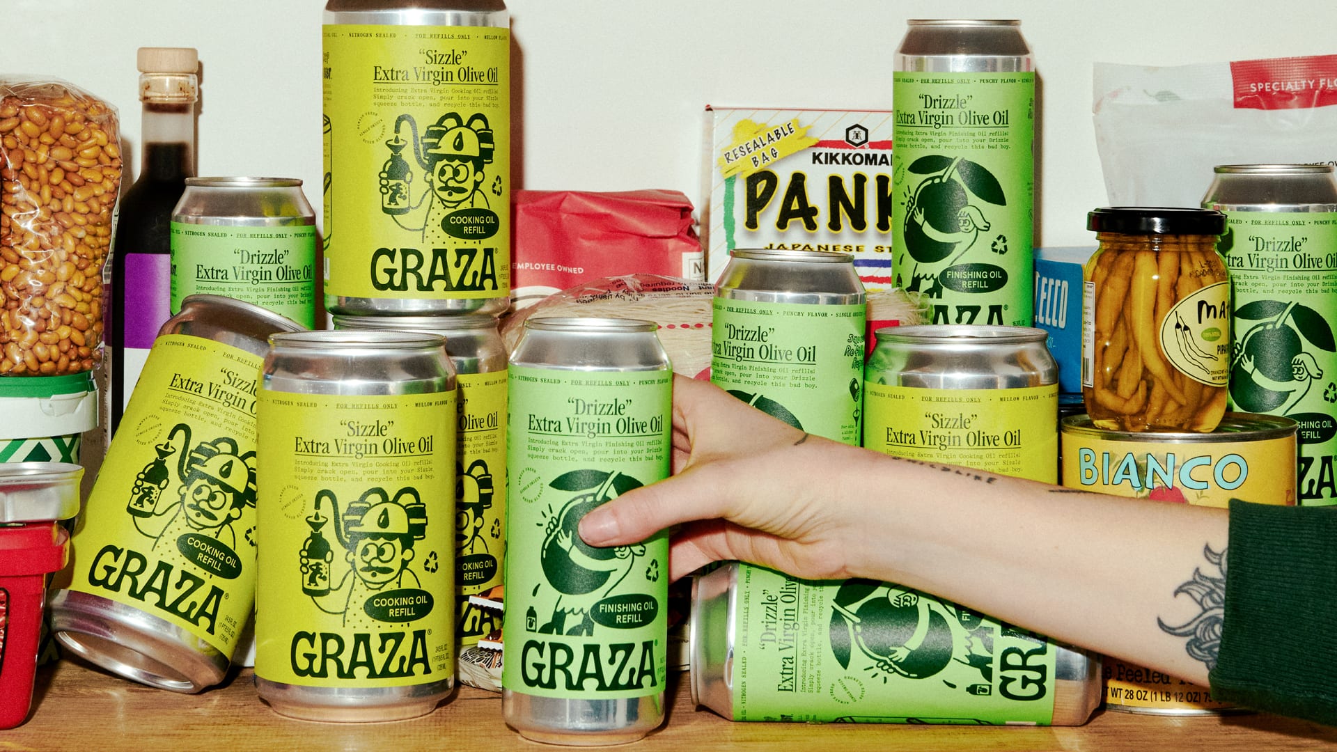 Graza now offers refills of its olive oil—in beer cans - Fast Company