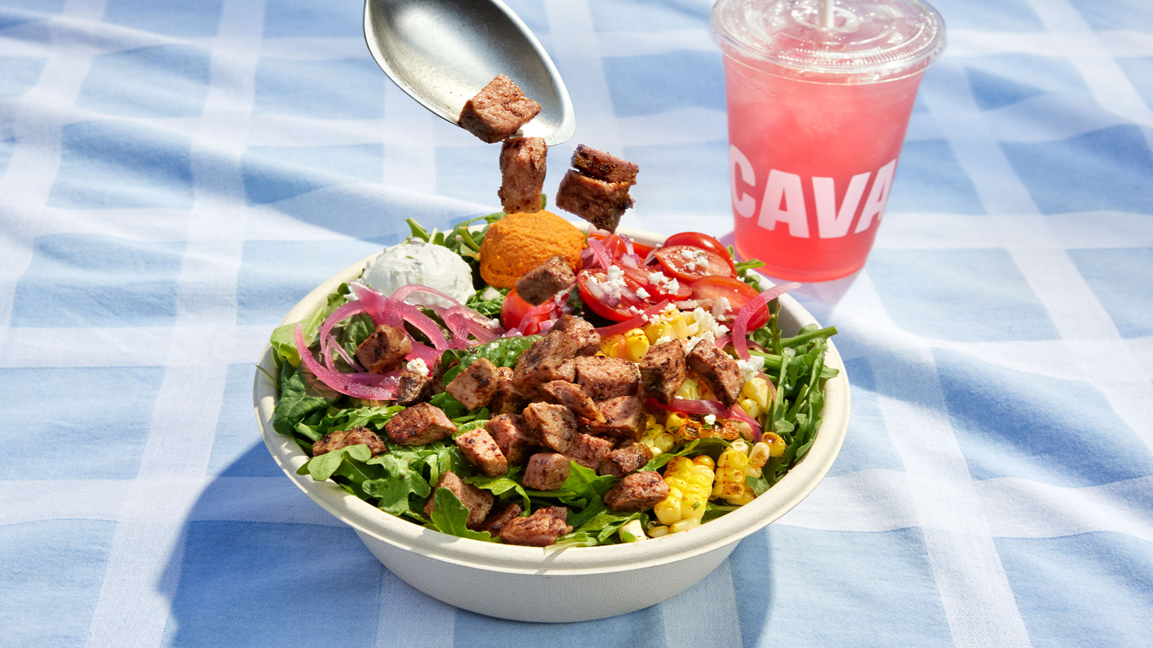 Cava brings beef back with a steak menu item to rival Sweetgreen's ...