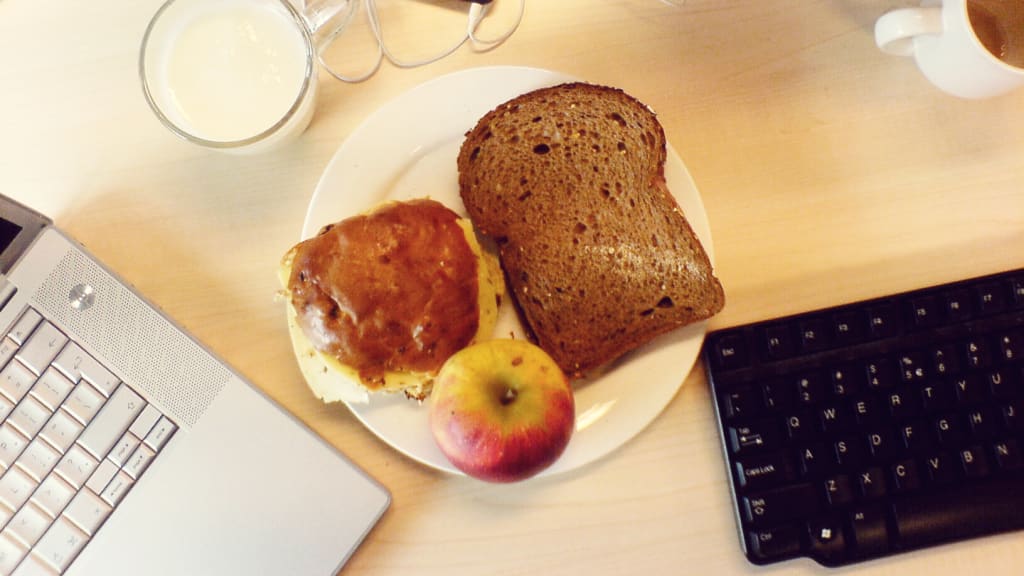 Hate Happiness? Then Keep Eating Lunch At Your Desk - Fast Company