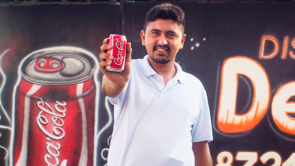 Coke's logo gets a handmade upgrade for its new ad - Fast Company