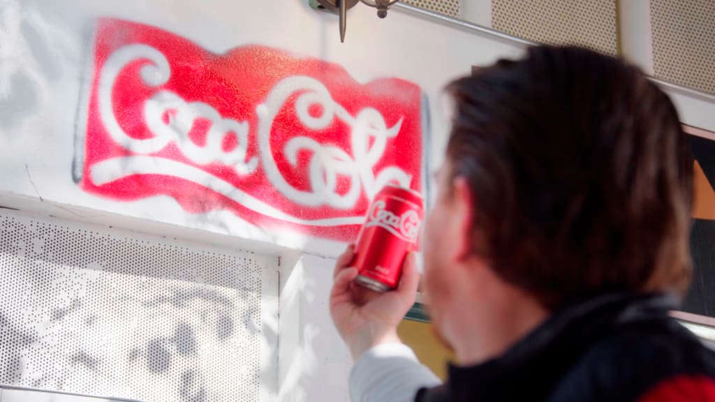 Coke's logo gets a handmade upgrade for its new ad - Fast Company