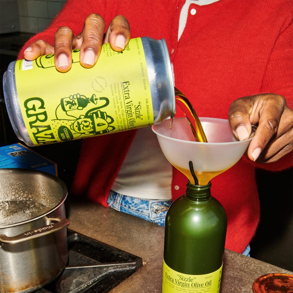 Graza now offers refills of its olive oil—in beer cans - Fast Company