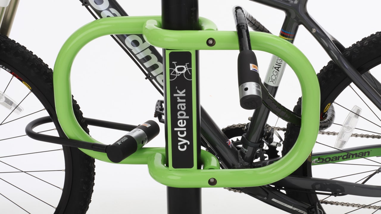 These Simple Devices Turn Every Sign Post Into A Bike Rack - Fast Company