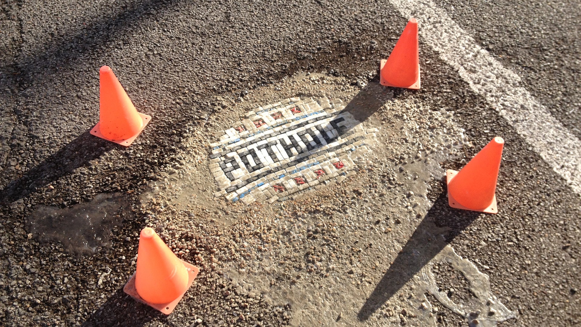 This Artist Is Filling In Chicago's Potholes With Mosaics - Fast Company