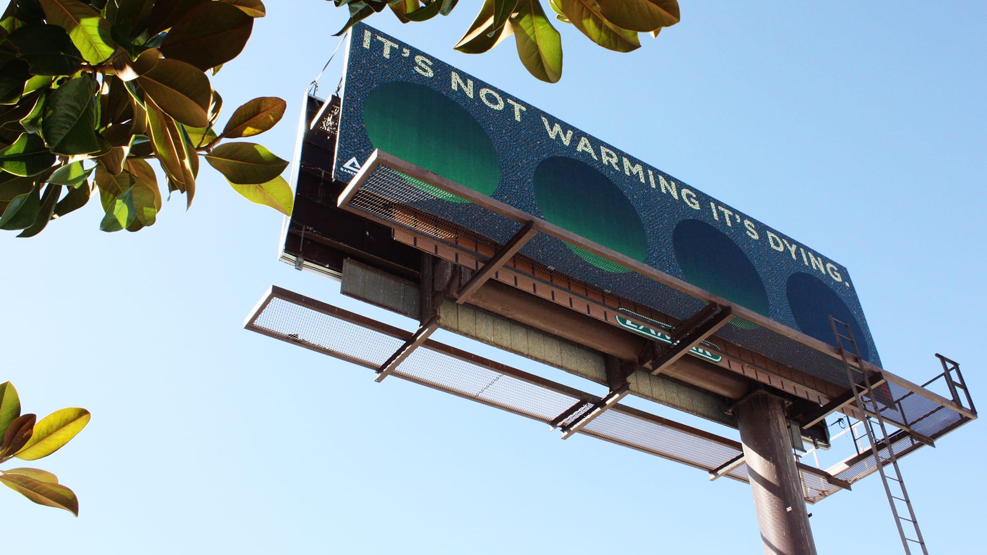 Soon You Can Wear A Milton Glaser Climate Change Billboard On Your Back ...