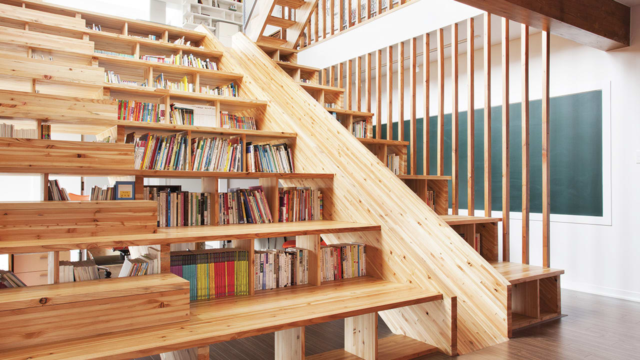 A Grown-Up Library, With A Built-In Slide For Kids - Fast Company