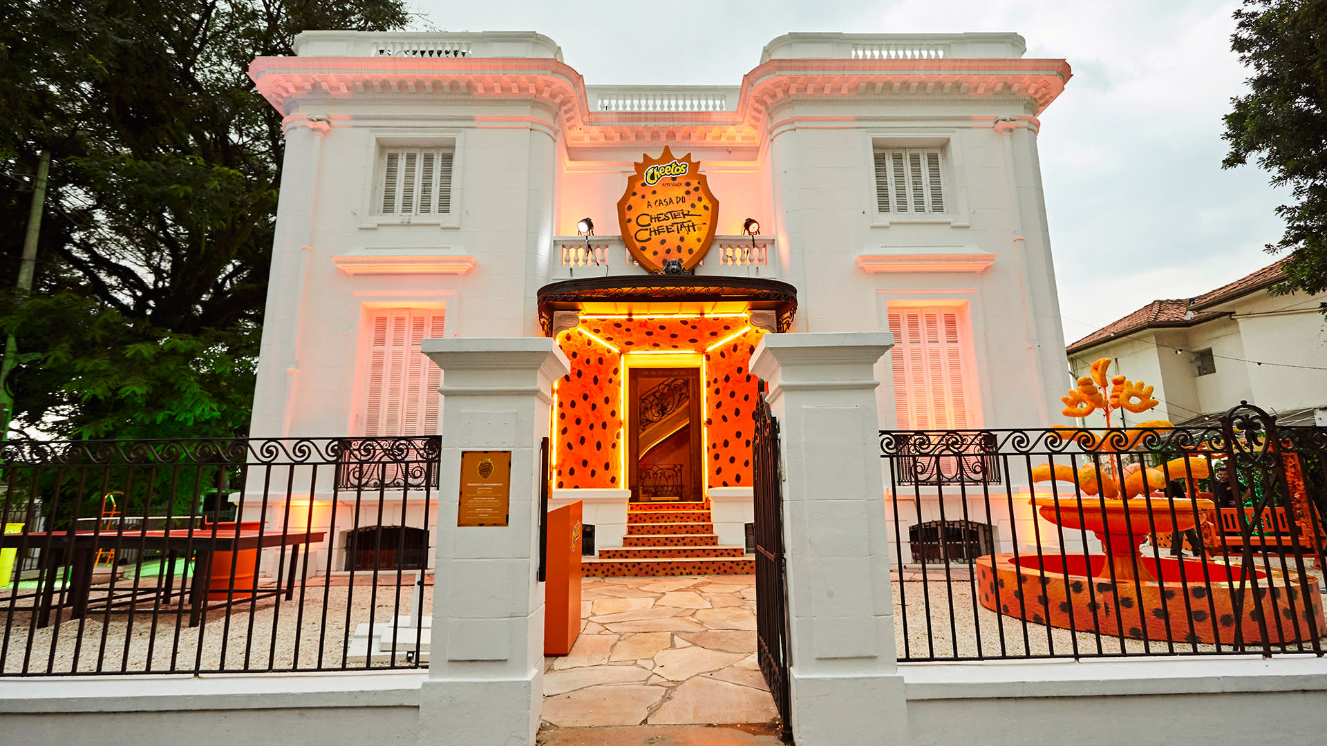 You have to see this Cheetos-themed mansion, a real thing that actually ...