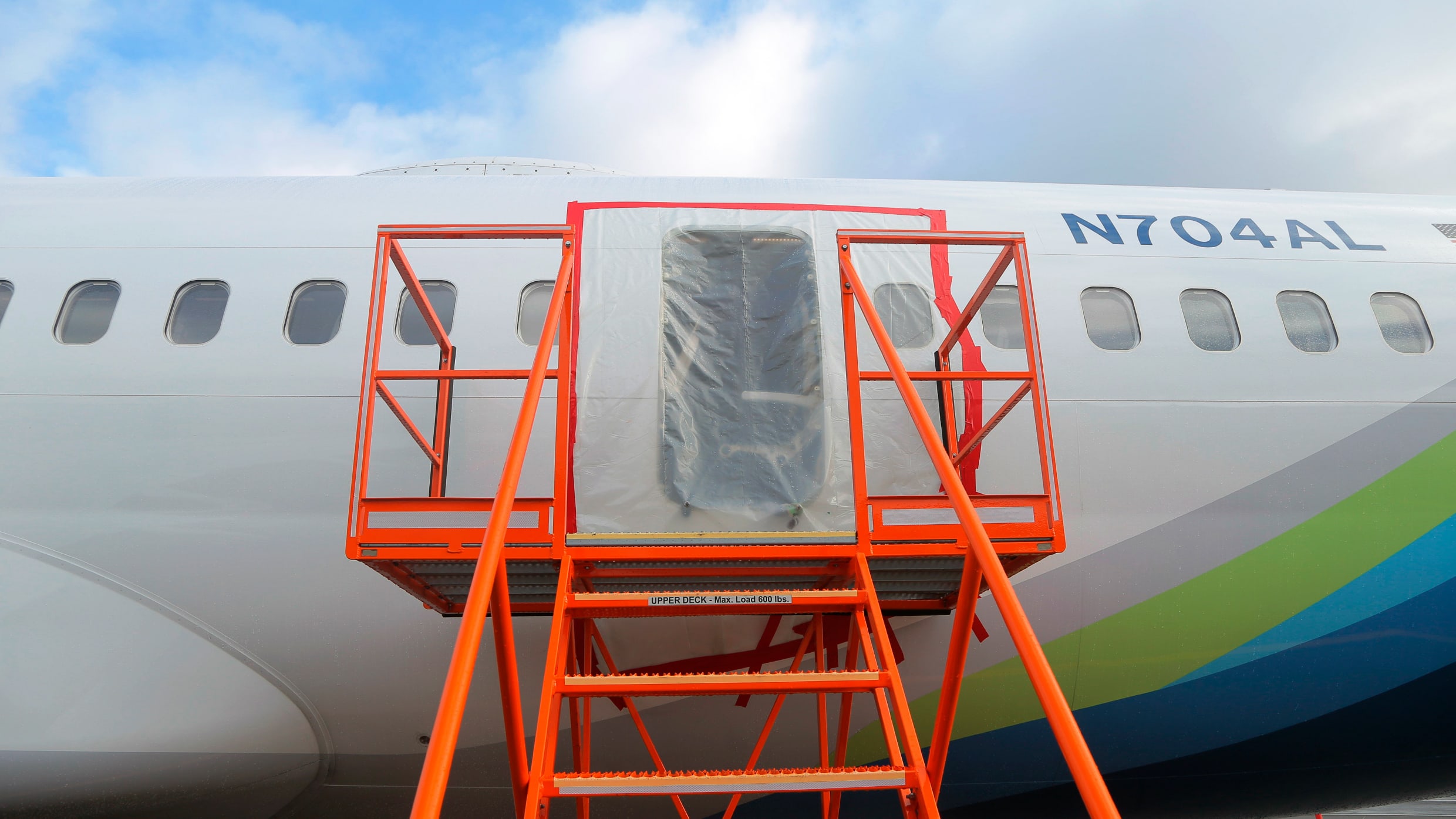 What is a door plug, and why do some airplanes have them?