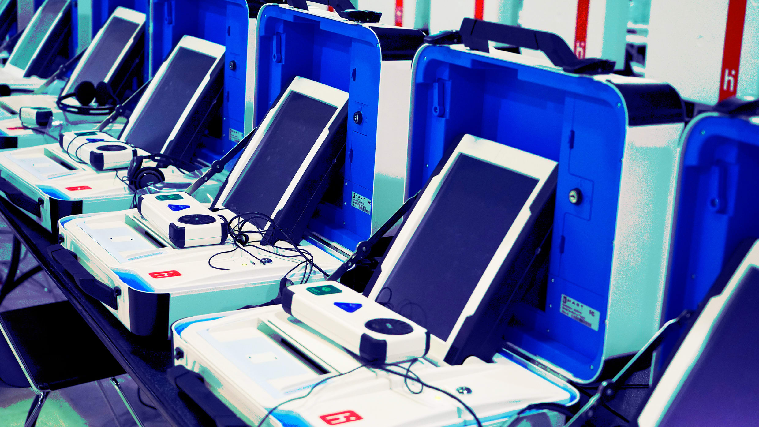Voting machines are costly and black-boxed. Some towns are trying ...