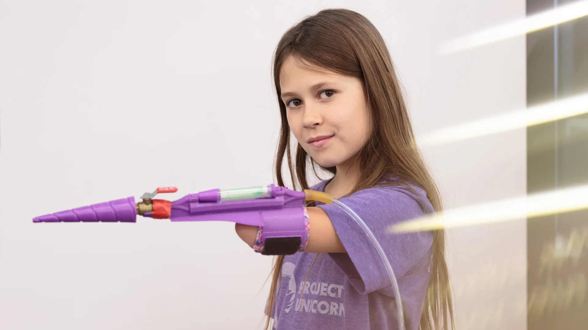 The Girl Behind The Sparkle-Shooting Prosthetic Arm Is Just Getting ...