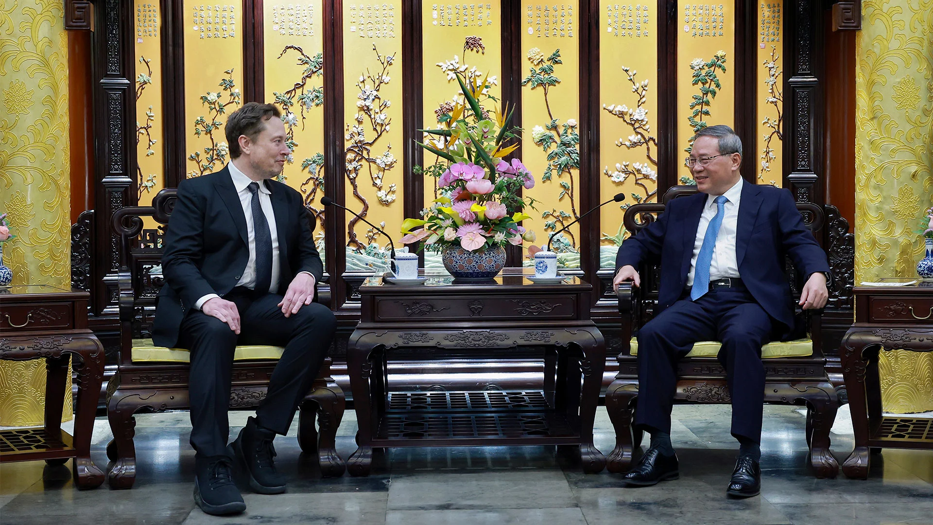 Tesla’s Elon Musk meets with Chinese officials amid trade tensions with ...