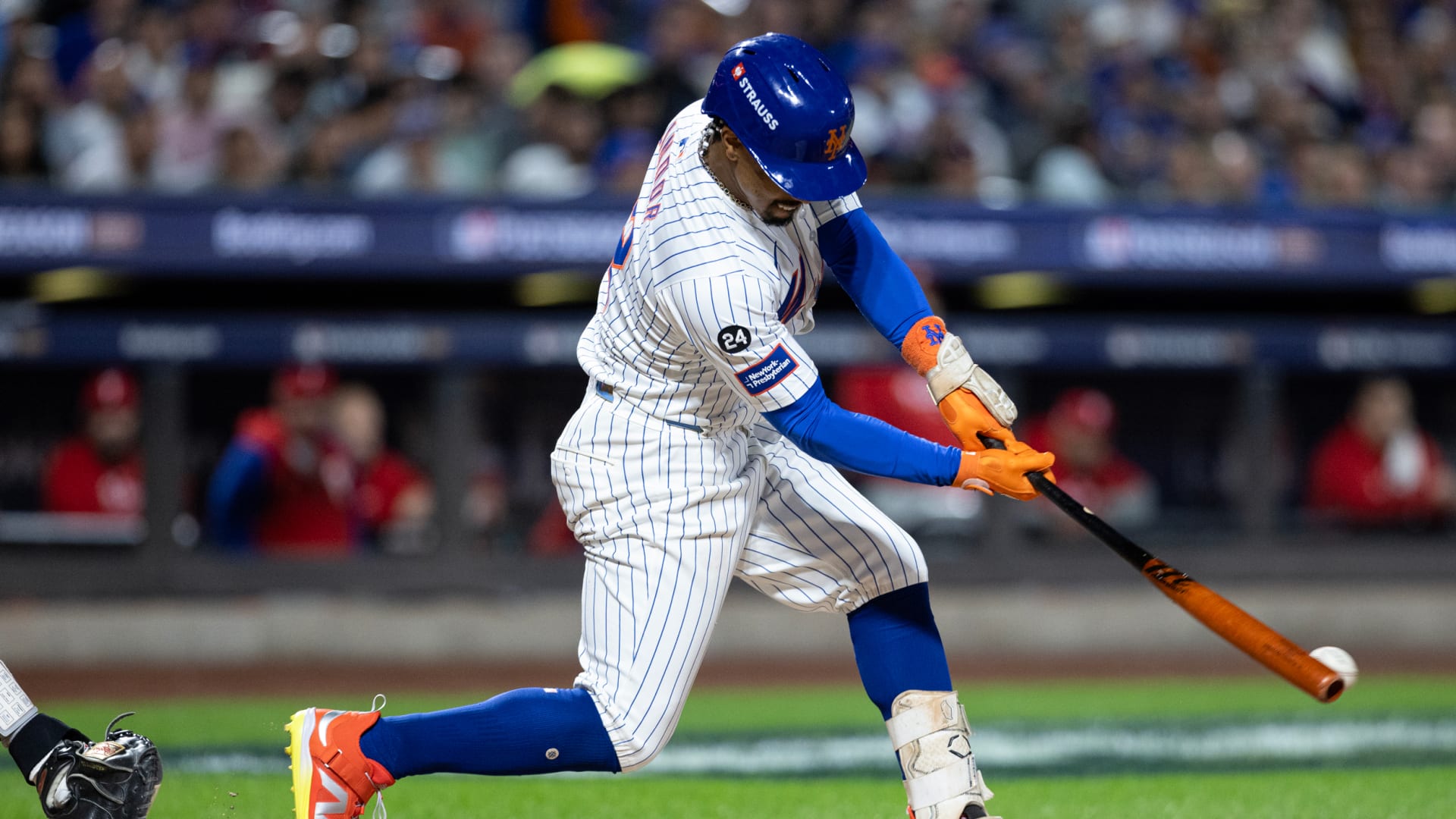 What's the deal with those Strauss decals on MLB batting helmets ...