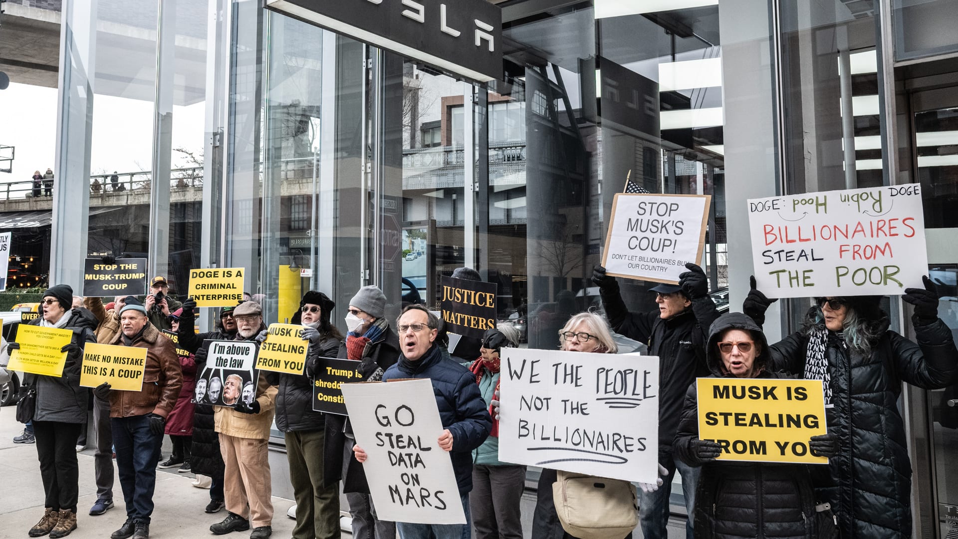 Tesla dealership protests have inspired a new generation of signs ...