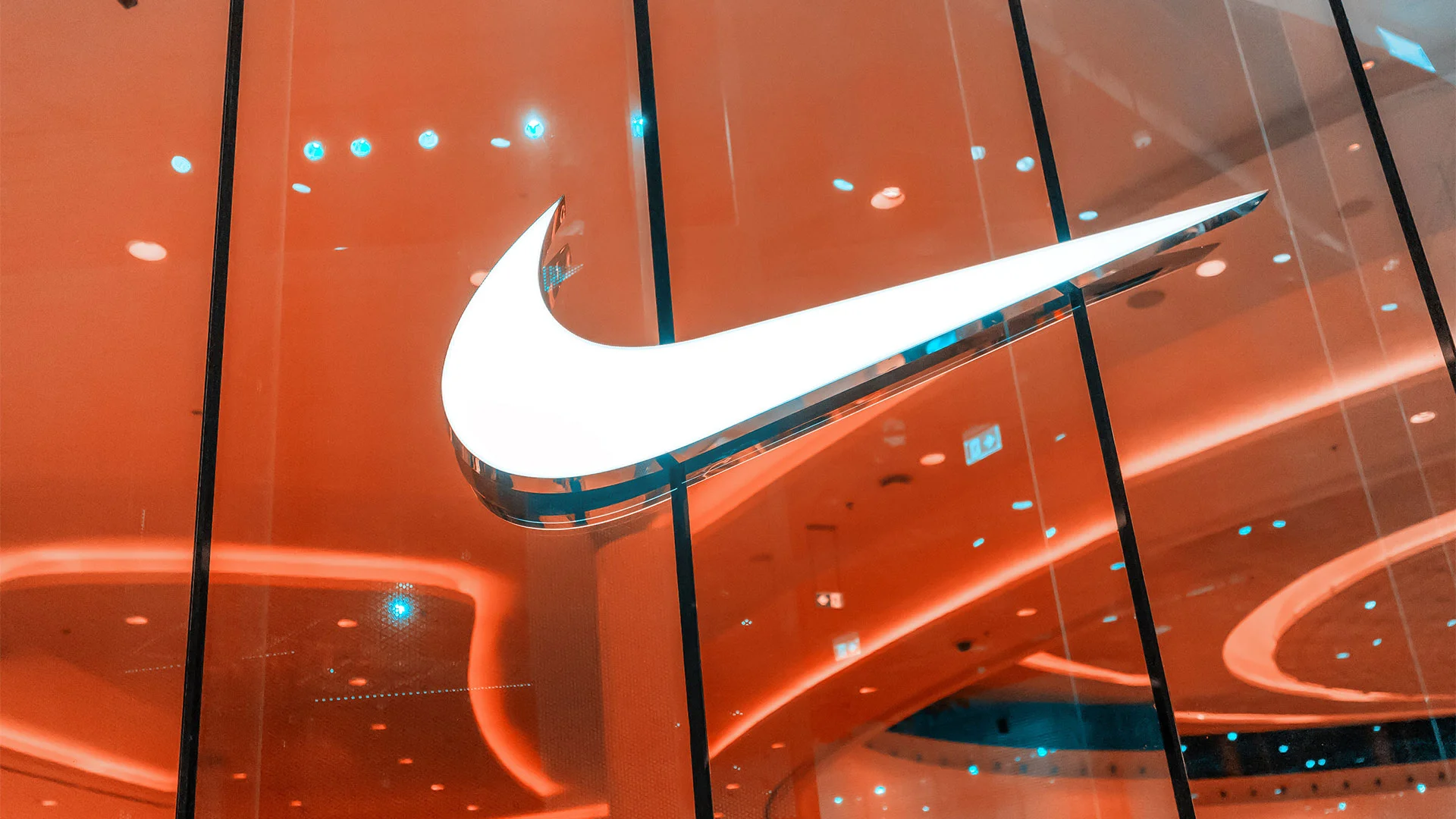Nike stock price today: shares rise despite tariffs, revenue drop ...