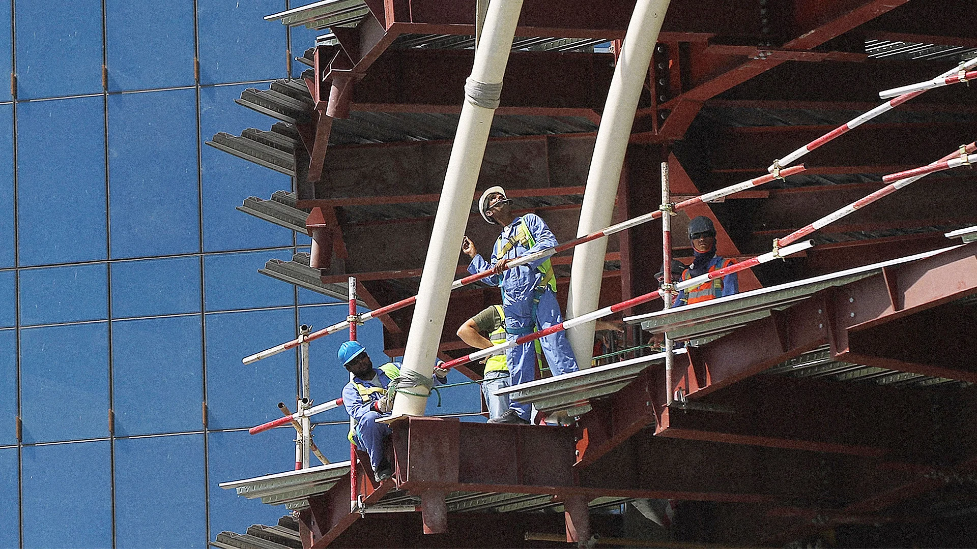 How Migrant Workers Literally Pay To Build Architecture - Fast Company