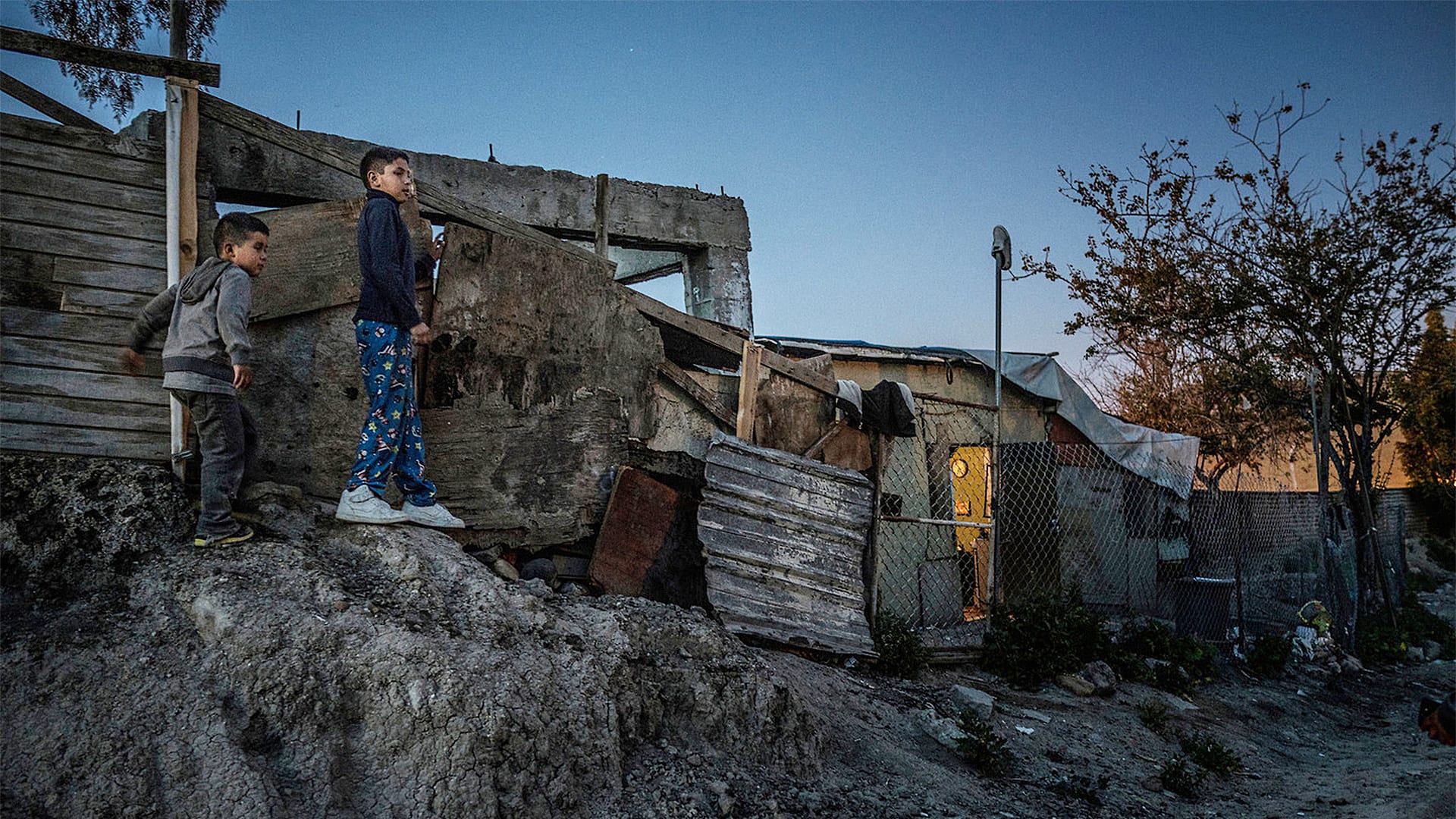 These Photos Take You Into The Makeshift Community Pressed Against The ...