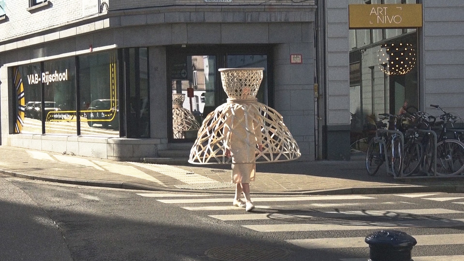 From massive hats to rattan cages: Fashion gets a socially distanced ...