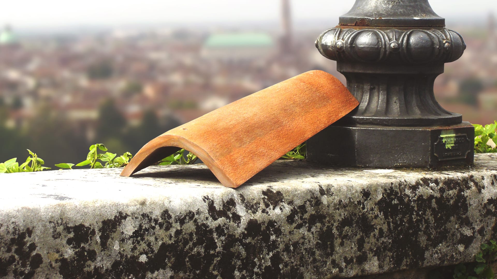 These 'terra-cotta' tiles blend in perfectly with Italian roofs. But ...