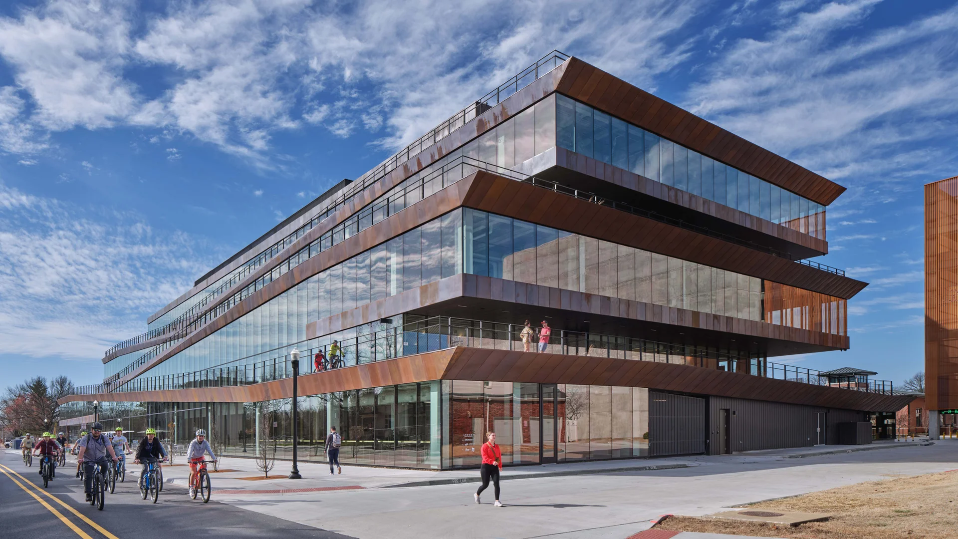 A new bikeable office building in Arkansas is lined with a switchback ramp