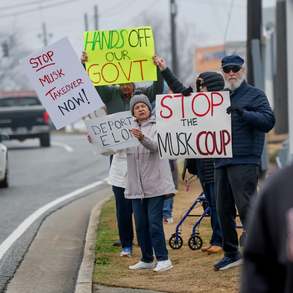 Tesla dealership protests have inspired a new generation of signs ...