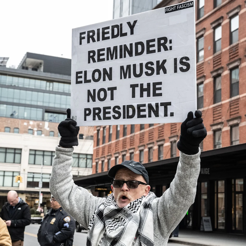 Tesla dealership protests have inspired a new generation of signs ...