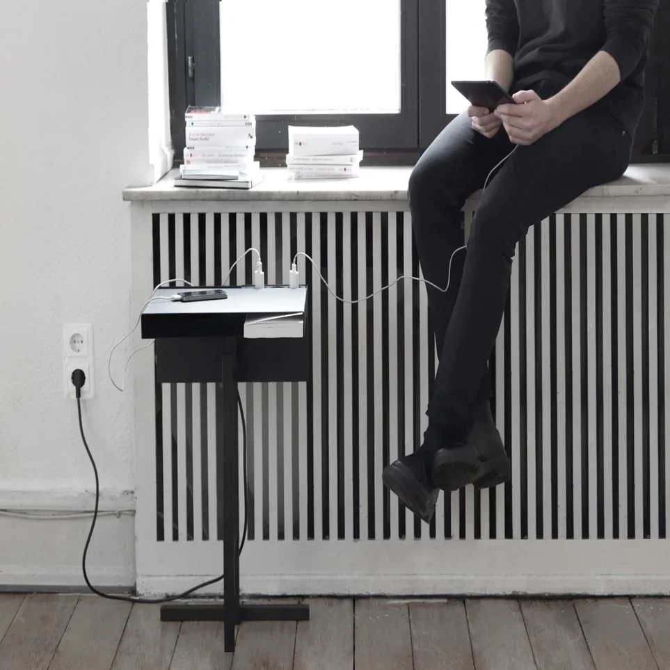 A Designer Table That Embraces Embarrassing Cords - Fast Company