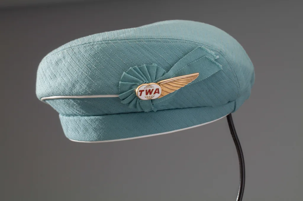 A Cultural History Of Flight Attendant Uniforms, From Go-Go Boots To ...