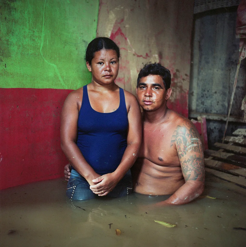 These photos of flood victims tell the human story of climate change ...