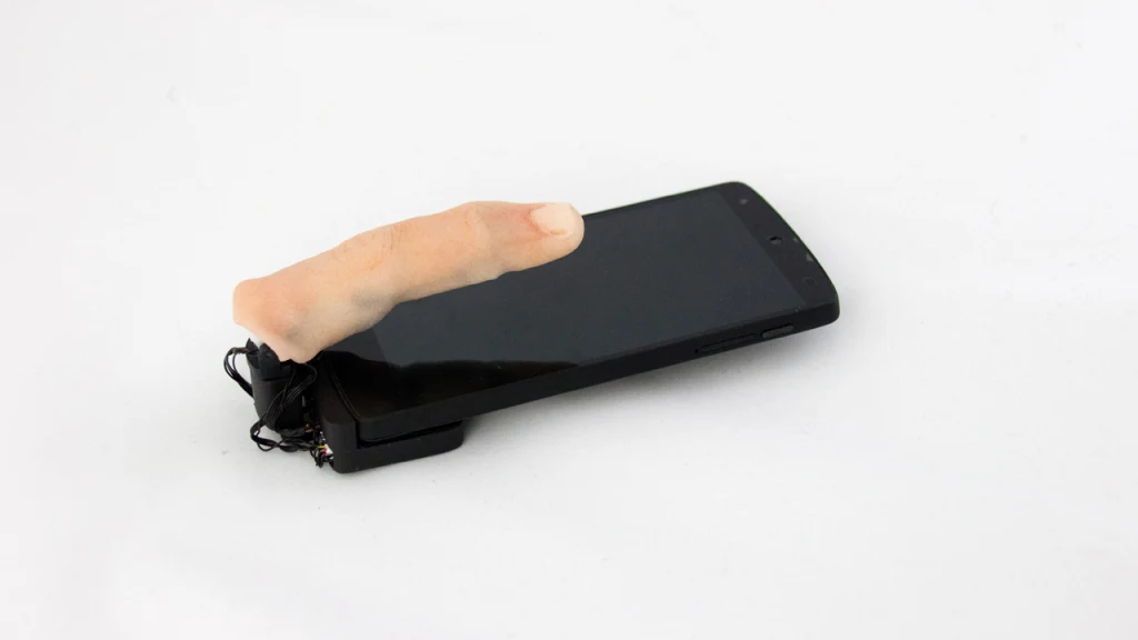 This nightmarish attachment gives your phone a finger of its own - Fast ...