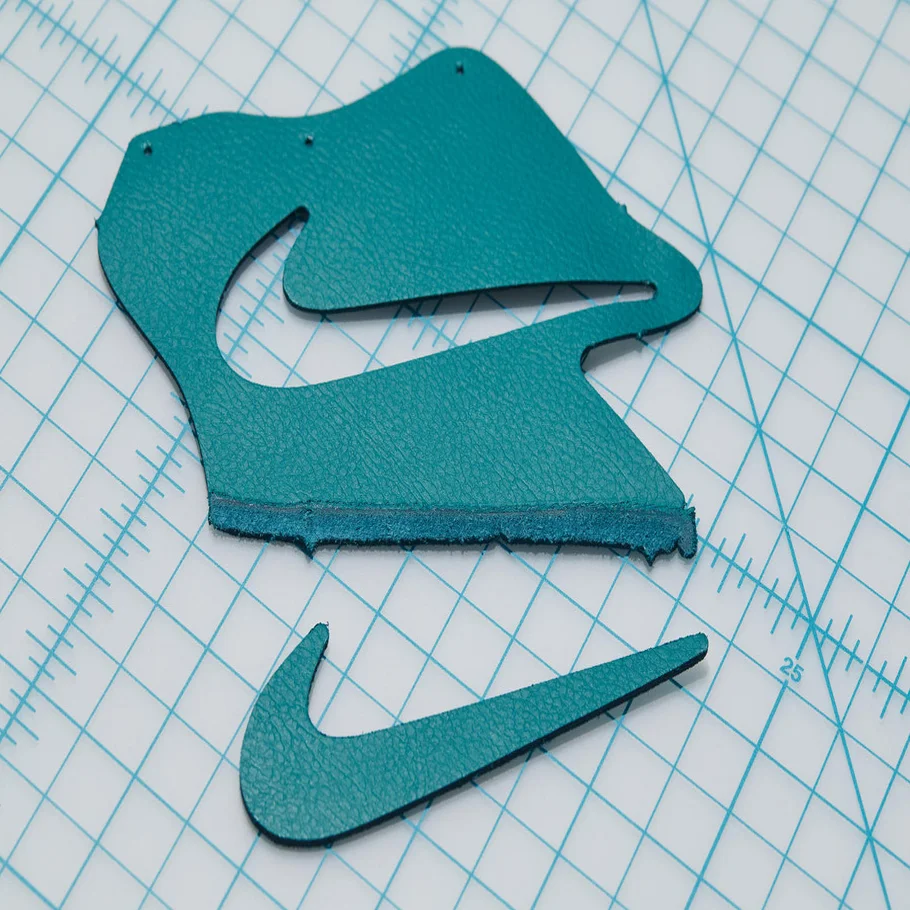 The puzzle-like pattern on these Nike sneakers isn't just a cool design ...