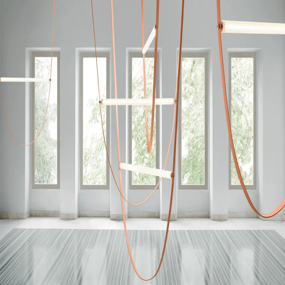 This stringy chandelier is all about its very long cord - Fast Company