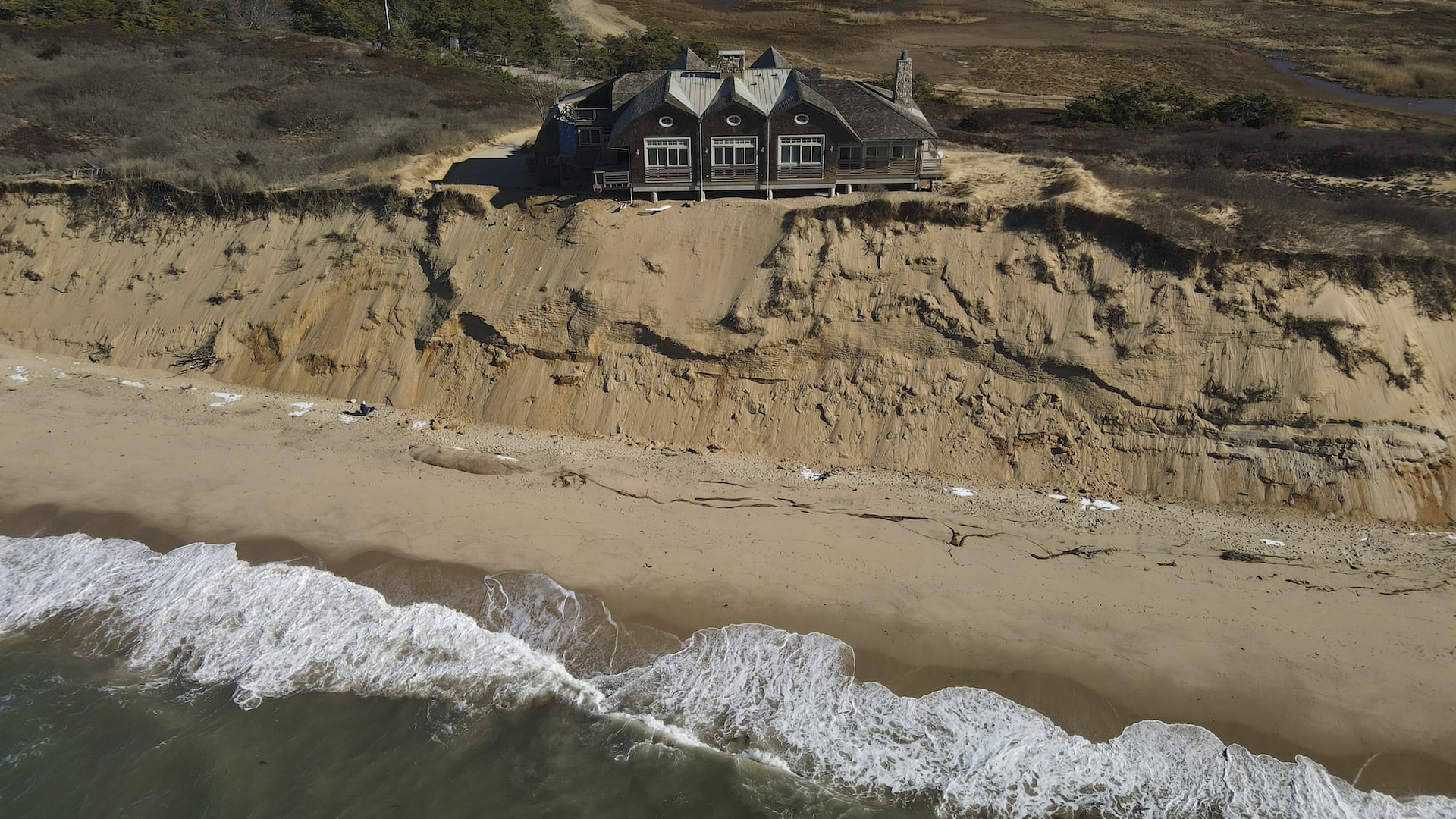 Erosion near Cape Cod home raises fears of collapse into bay - Fast Company