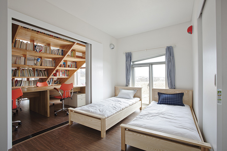 A Grown-Up Library, With A Built-In Slide For Kids - Fast Company