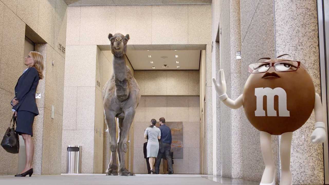 Ad Worlds Collide As Geico Gecko Stars In New M&M Commercial - Fast Company