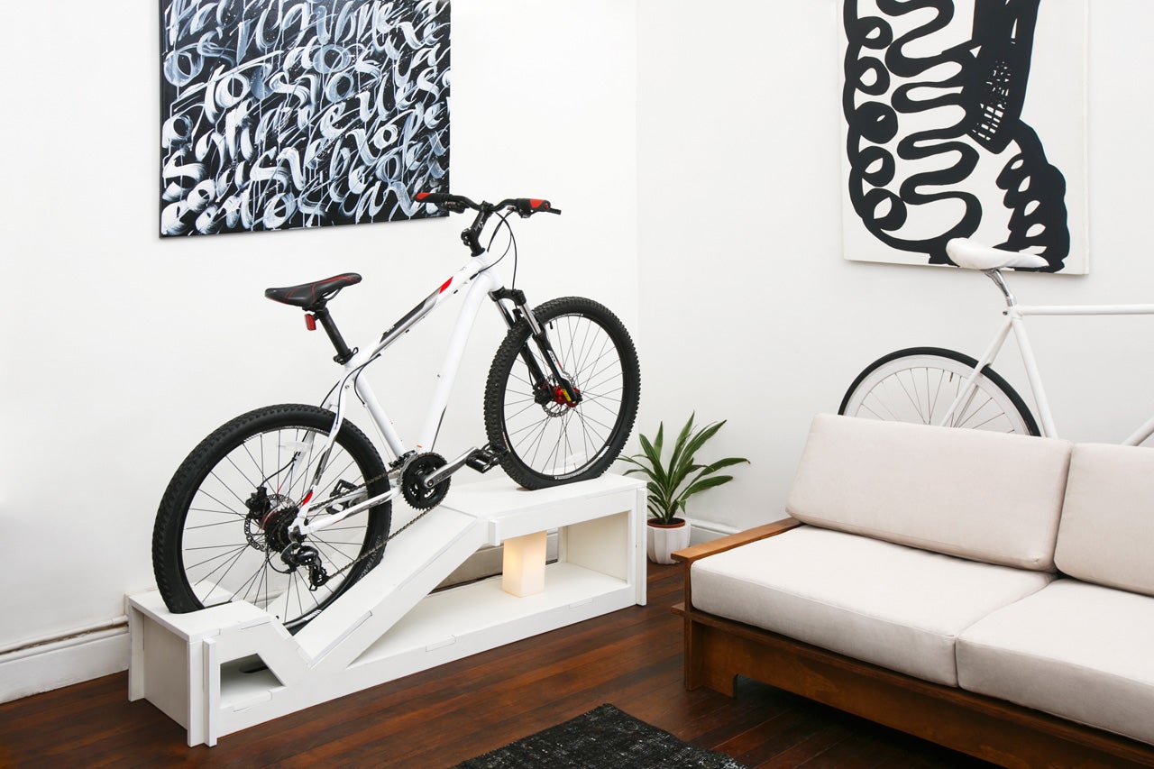 This Sofa, Bookcase, And Desk All Double As Places To Store Your Bike ...
