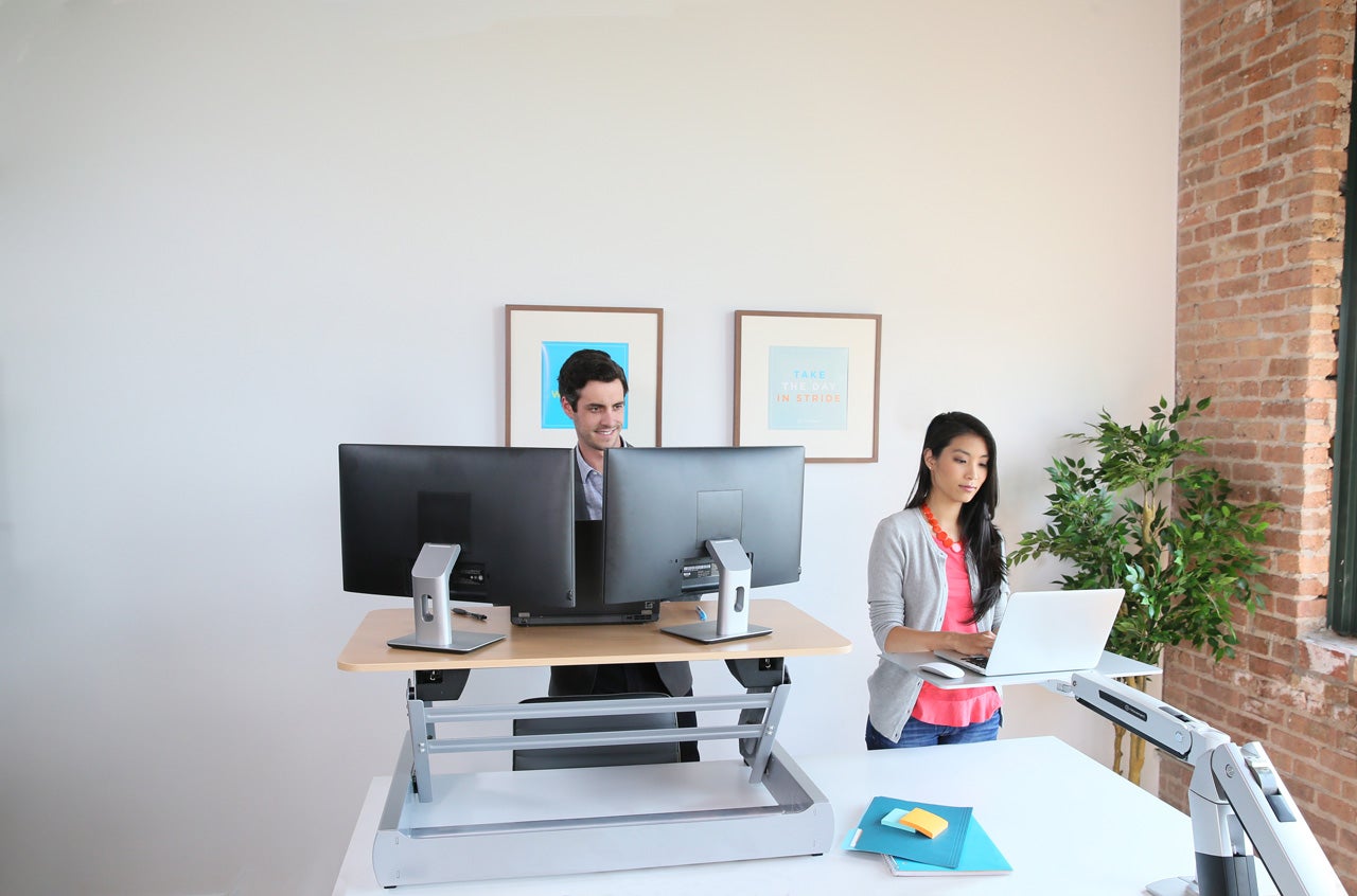 This Desk Goes From Sit To Stand With A Flick Of The Wrist - Fast Company