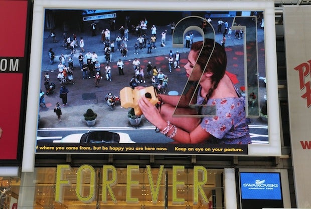 Giant Model in Spy Tech-Powered Billboard Plucks, Chucks Times Square ...