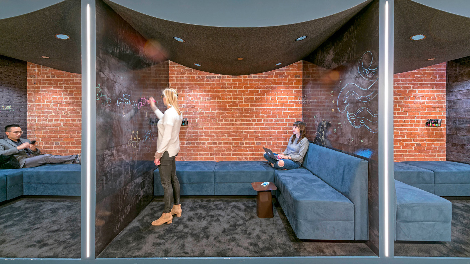 More people are working remotely, and it's transforming office design ...