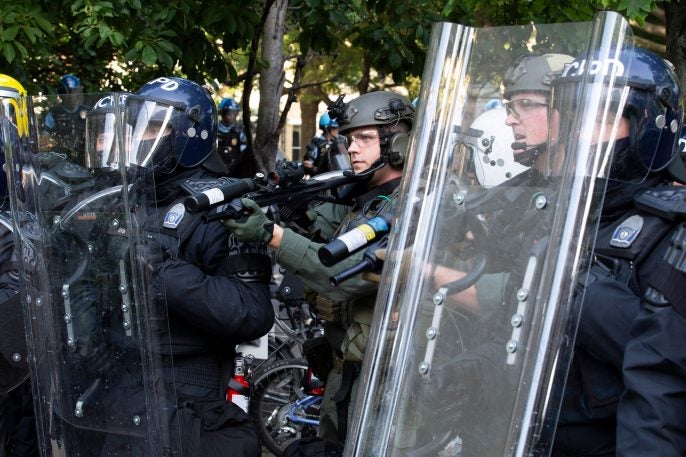 The twisted psychology of militarized police uniforms - Fast Company