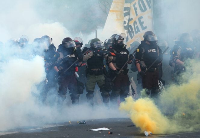 The twisted psychology of militarized police uniforms - Fast Company