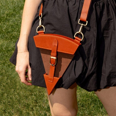 Nikolas Bentel's new purse is designed to hold a pizza slice