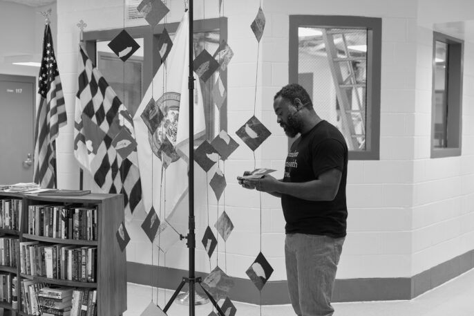 MacArthur genius Reginald Dwayne Betts is redesigning prison libraries
