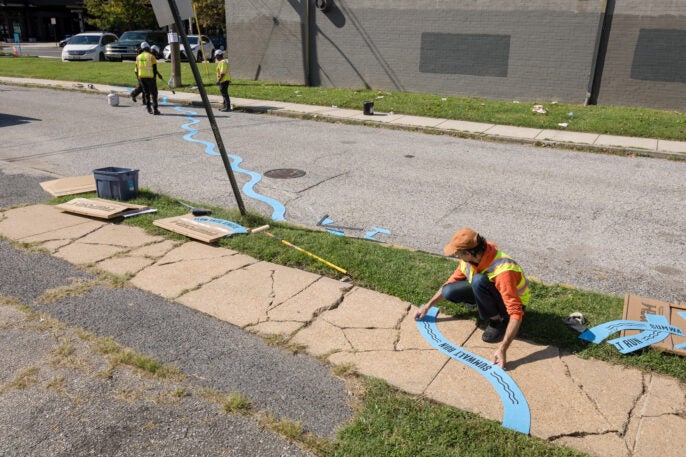 Baltimore buried a river in the early 1900s. Now, an artist is reviving it