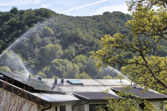 A Wyoming startup's rooftop sprinkler protects homes from wildfires